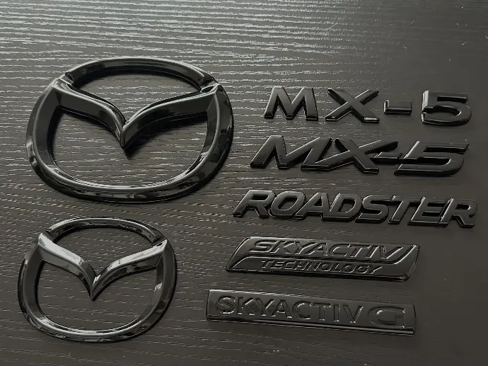 Glossy Black 7 Pieces Mazda Emblems Set For Miata ND1/ND2/ND3 | CarbonMiata